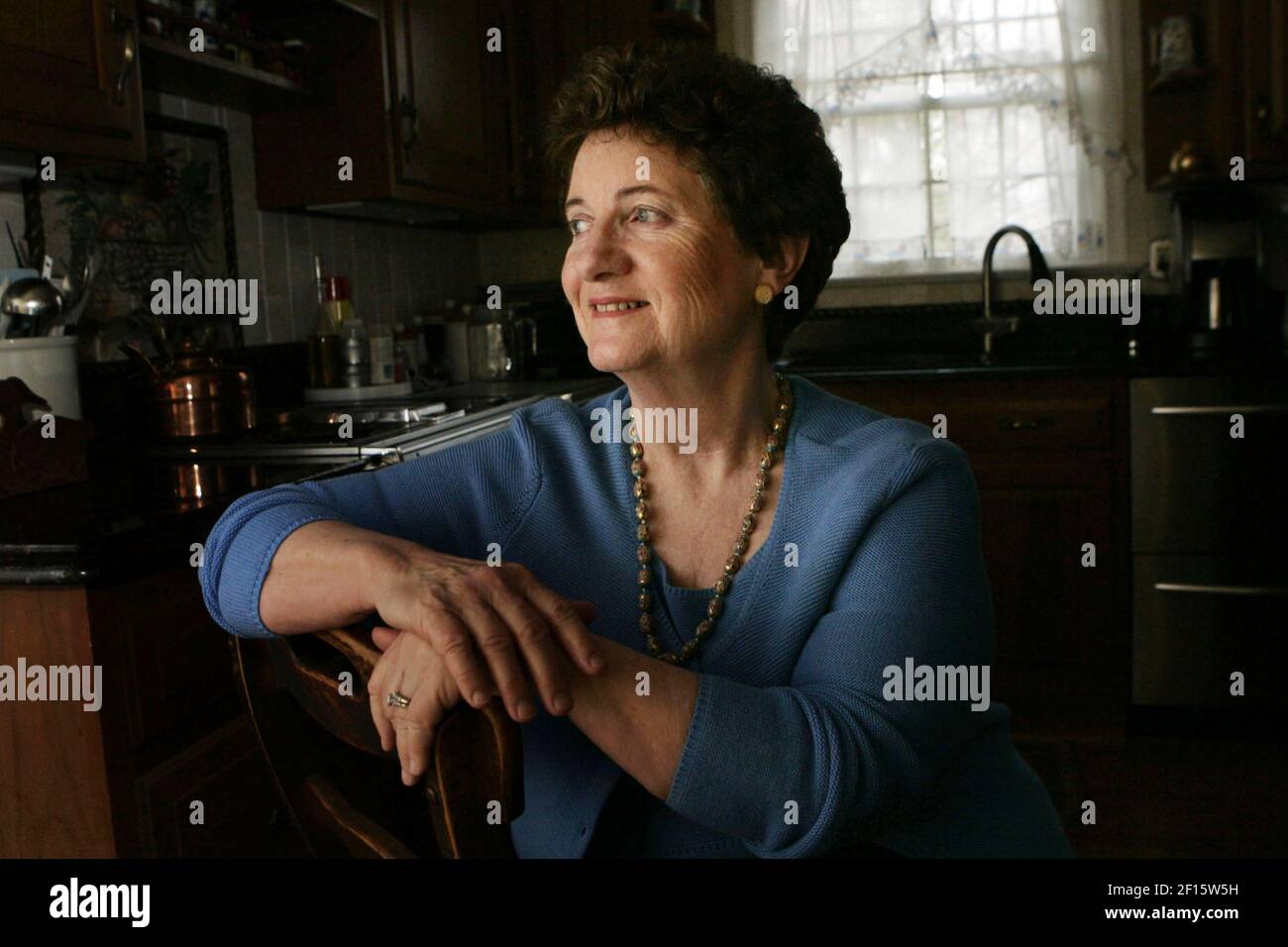 Pianist Georgiana Acchione, 73, sits in her home where she lives with ...