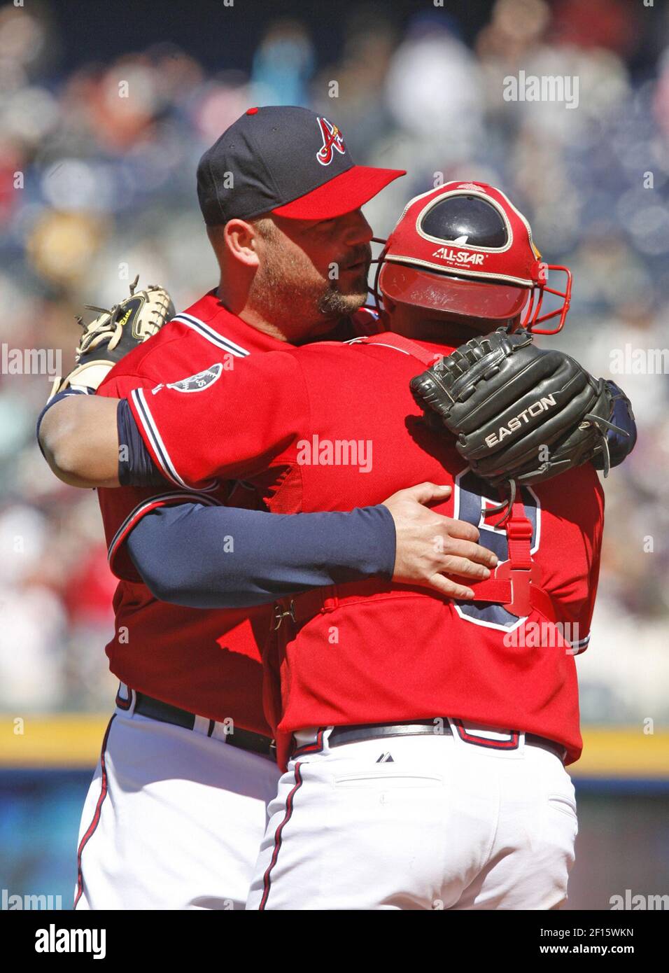 Atlanta Braves pitcher Bob Wickman (left) celebrates a 3-2 win against ...