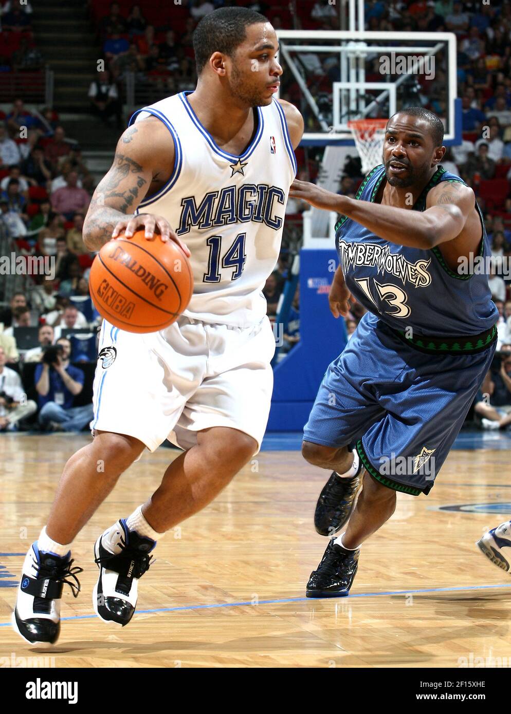 The Orlando Magic's Jameer Nelson drives past Minnesota Timberwolves ...