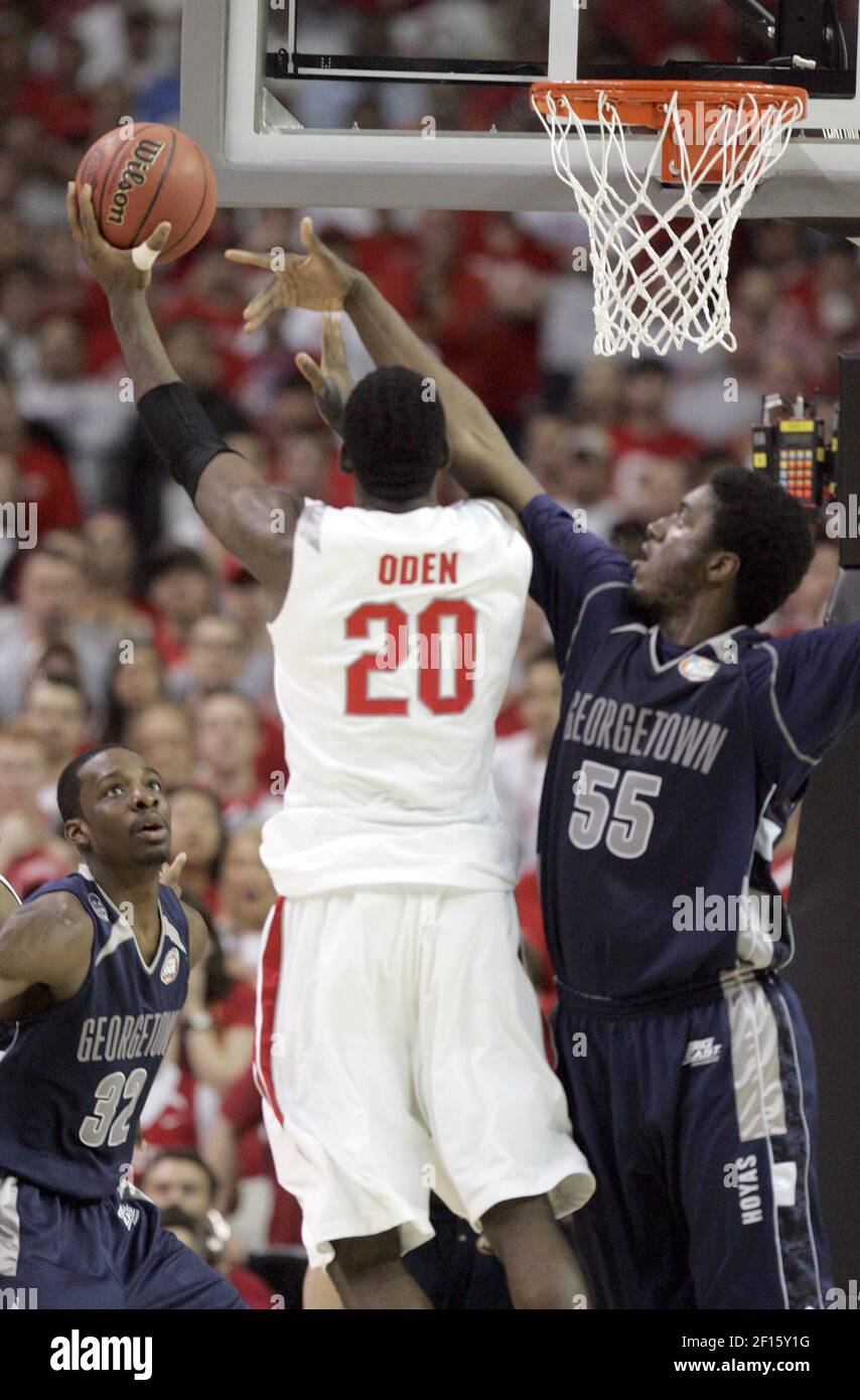 Ohio State's Greg Oden puts up a shot as Georgetown's Roy Hibbert ...