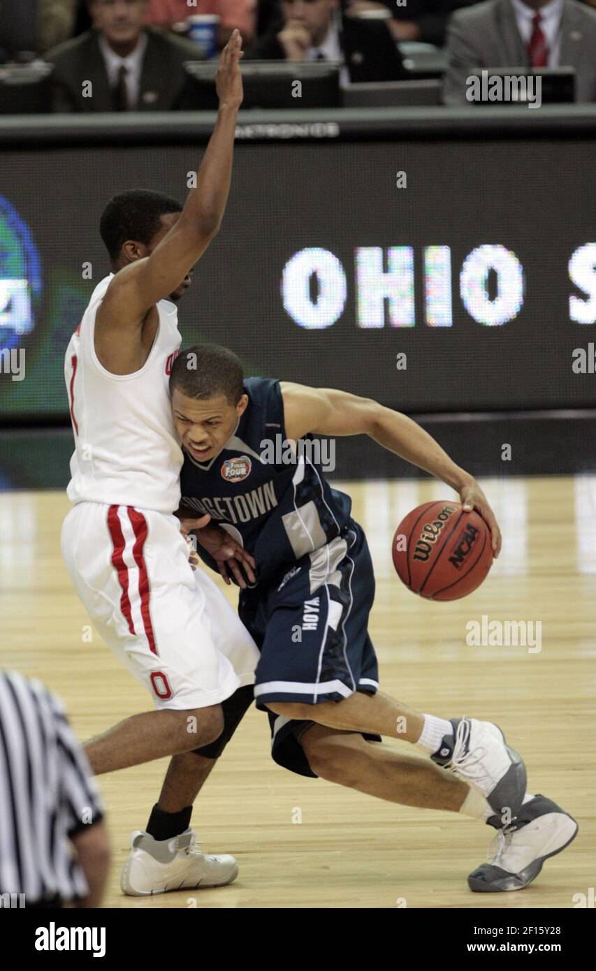 Ohio State guard Mike Conley Jr. defends against Georgetown guard ...