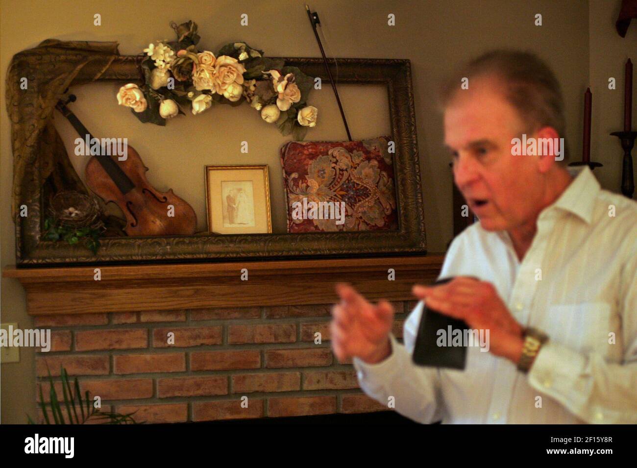 John Hively, co-owner of an interior design business called "Phi Design ...