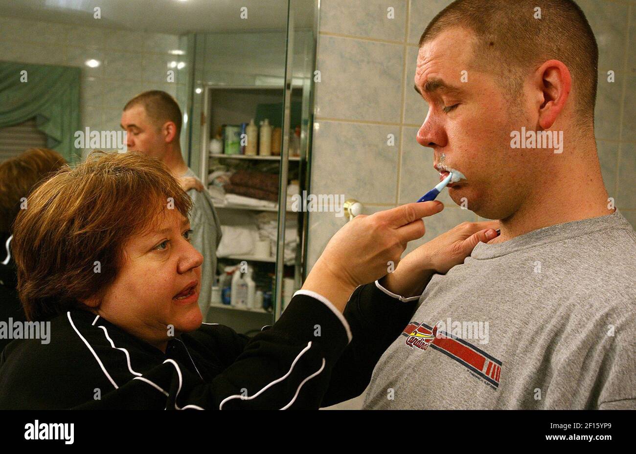 Michael Rodenberg, 33, shops for groceries in Kirkwood, Missouri, with ...
