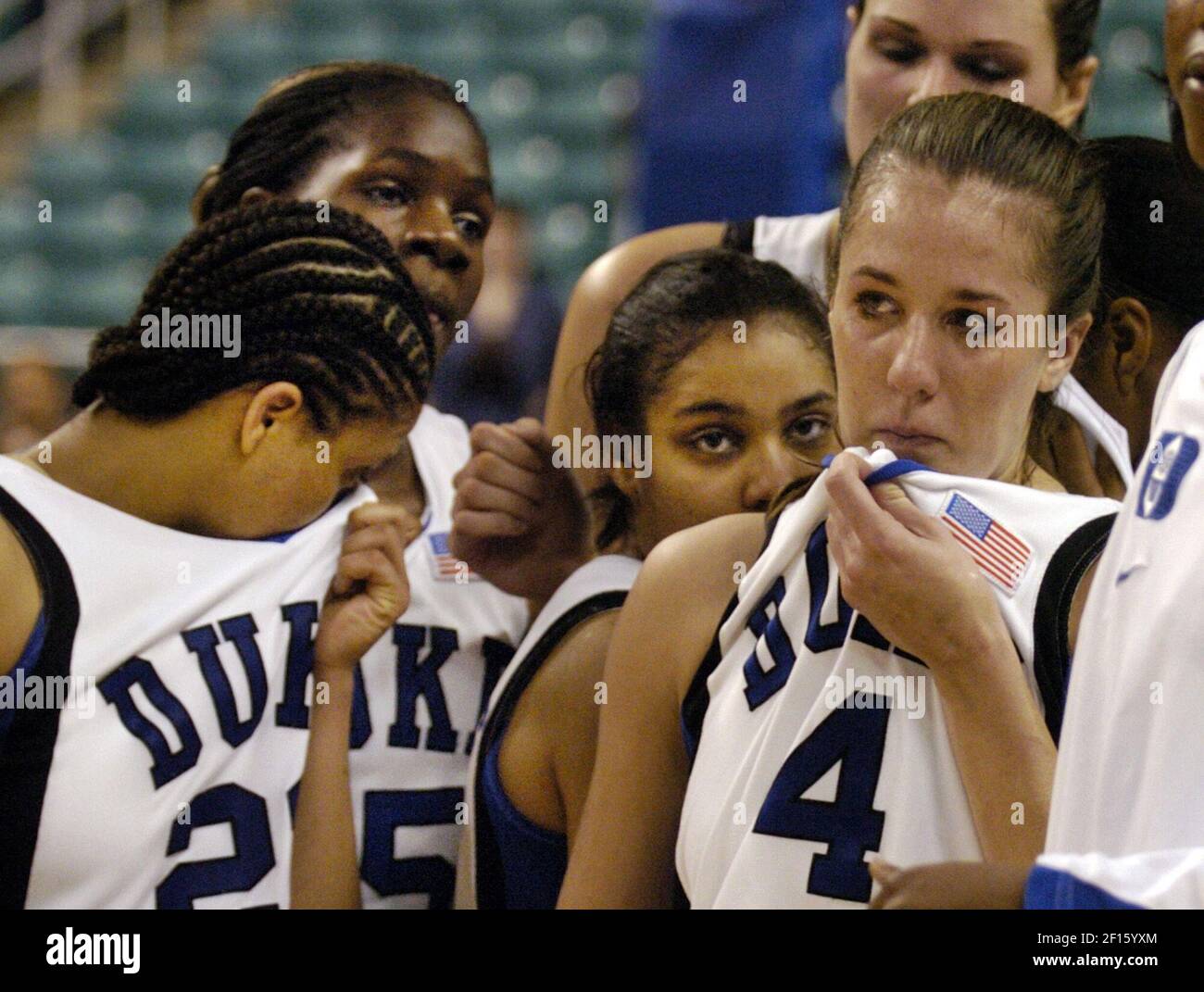 Duke players (left to right) Wanisha Smith, Bridgette Mitchell, Harding ...