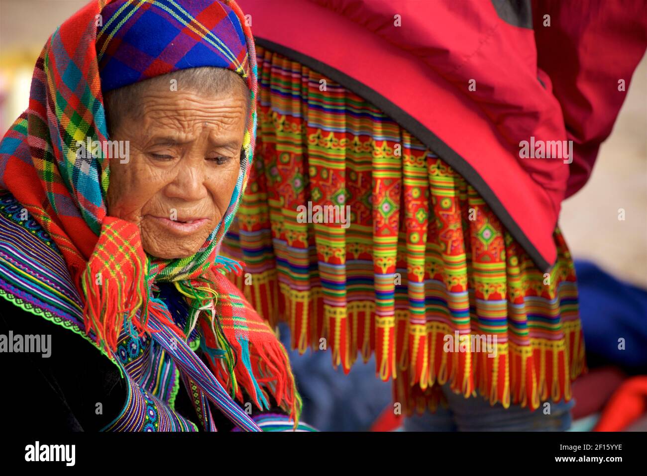 Elderly Flower Hmong woman in traditional style attire. Bac Ha market ...