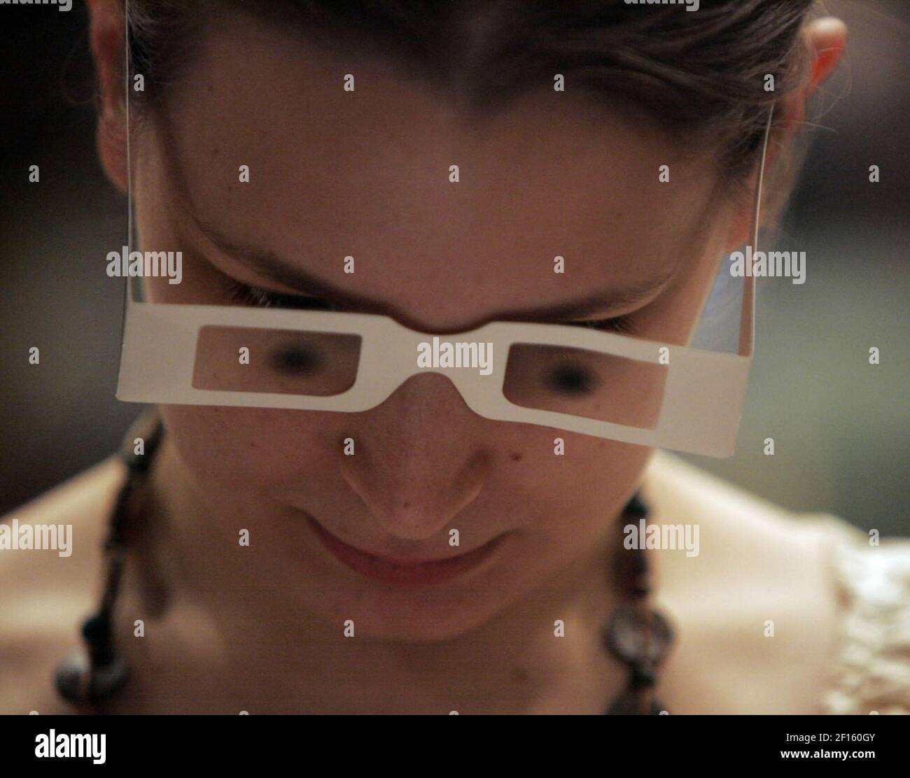 April Peterson, 25, a medical student, tries on a pair of "glasses ...