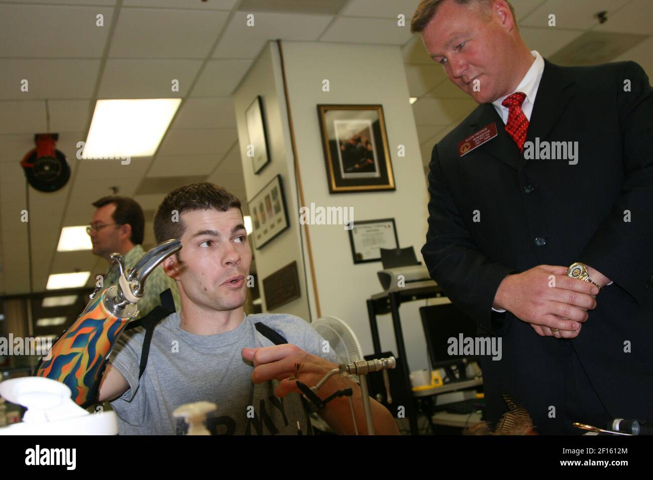 Georgia State Rep. Allen Freeman listens as Darrell Salzman, 27, of ...