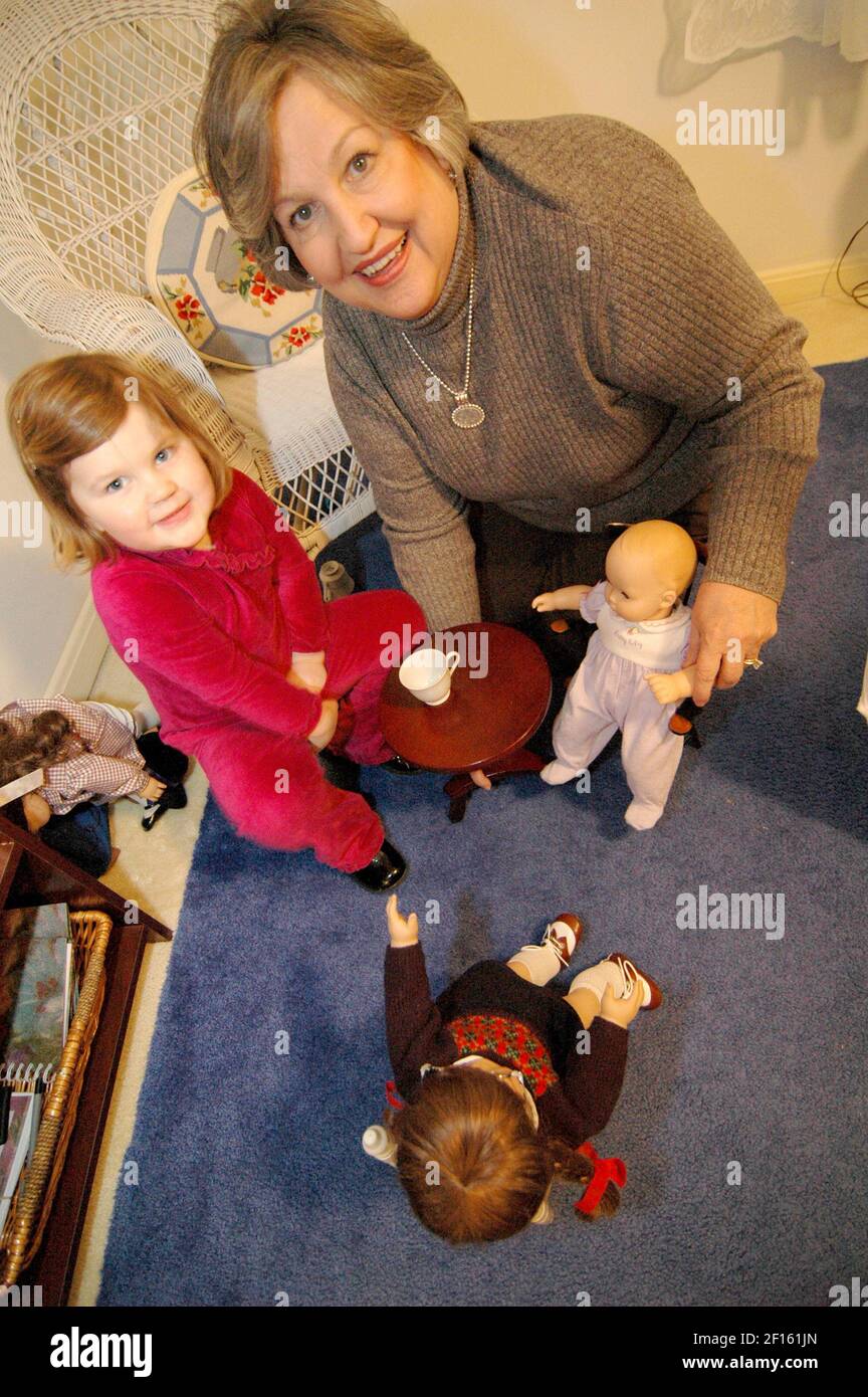 Allison Hill, 2, (left) poses with her grandmother, Glenda Hill, right ...