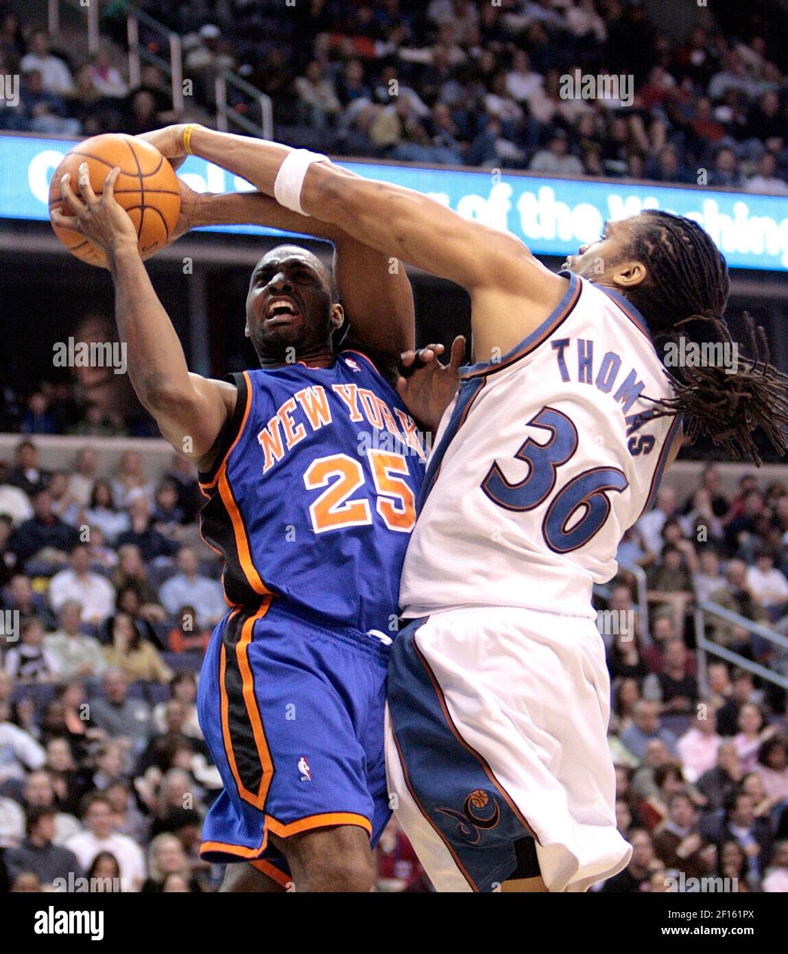 New York Knicks Mardy Collins (25) is fouled by Washington Wizards Etan ...