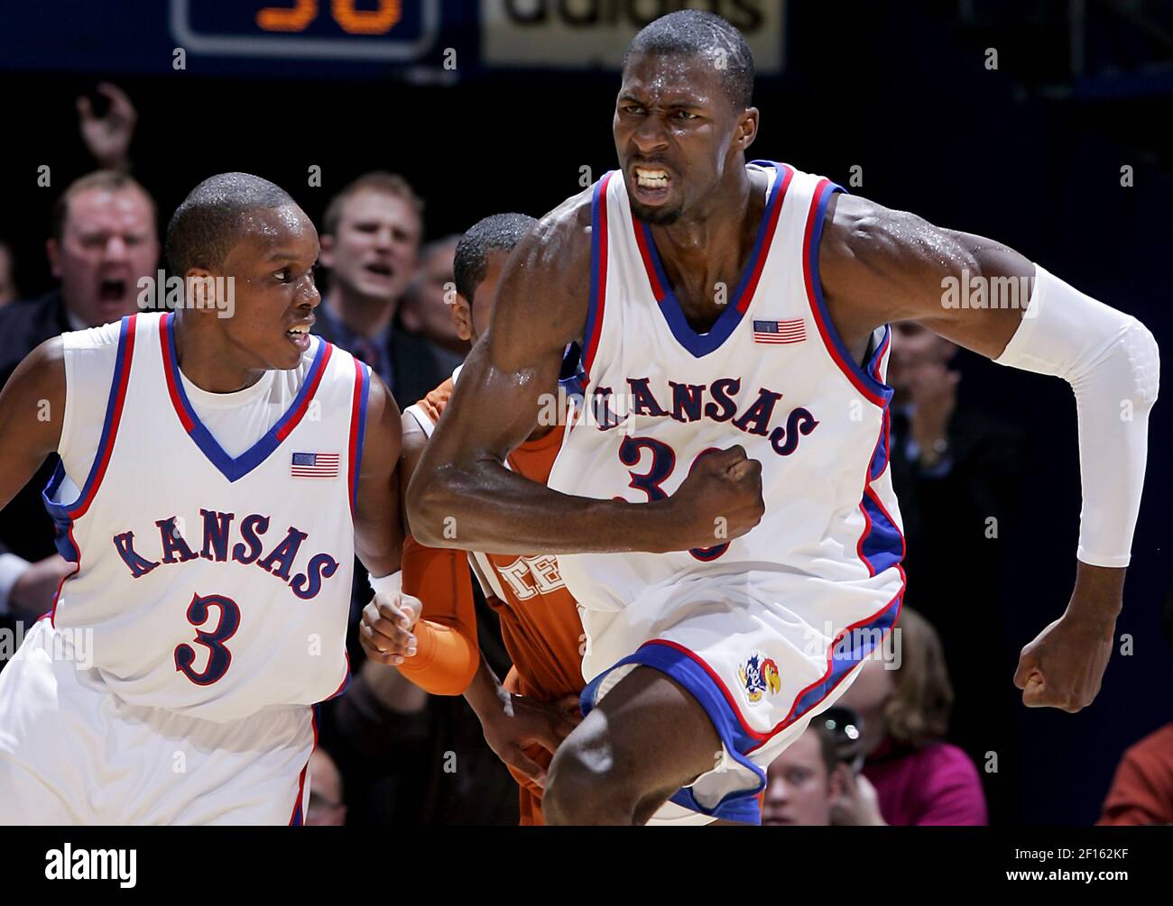 Kansas' Julian Wright (right) and the Jayhawks flex their stuff to come ...