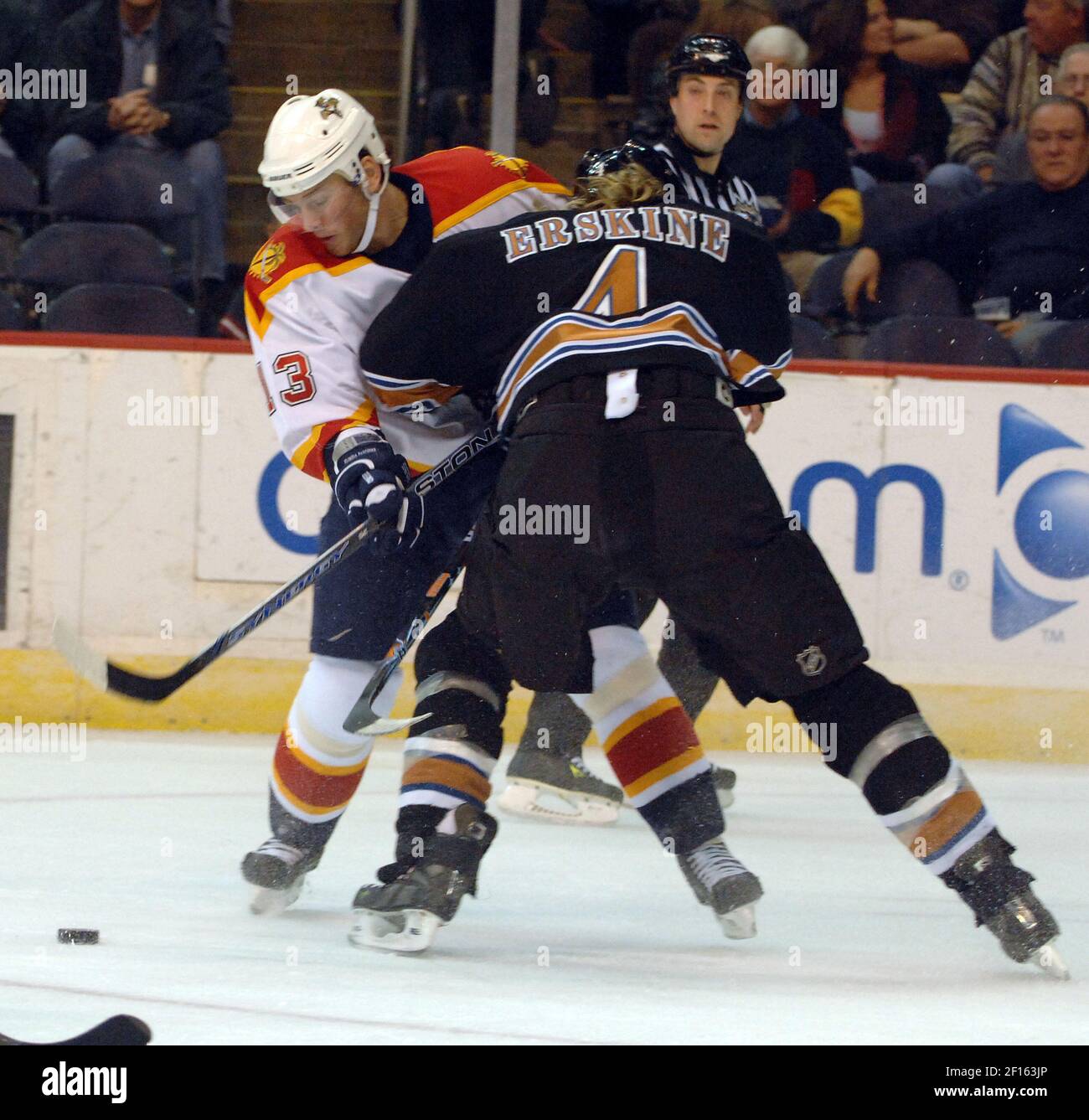 The Florida Panthers' Juraj Kolnik (13) is defended by the Washington ...