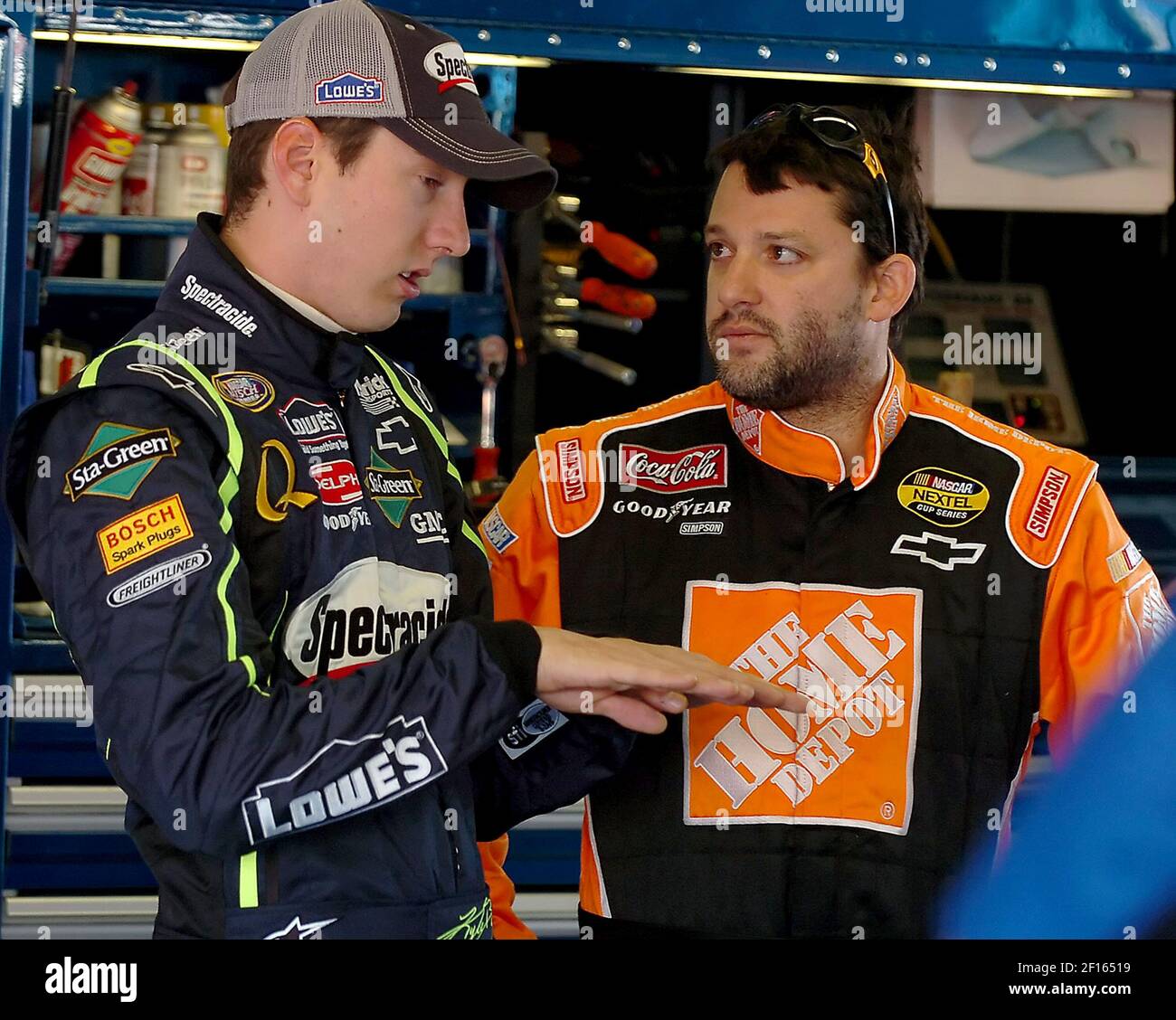 NASCAR NEXTEL Cup drivers Kyle Busch and Tony Stewart (right) talk in ...