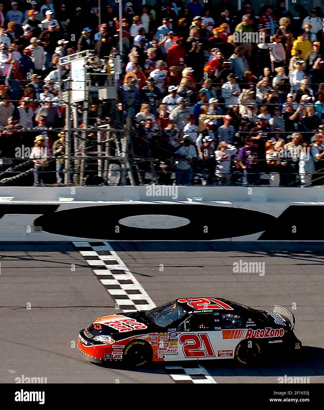 Kevin Harvick crosses the finish line to win the NASCAR Busch Series ...
