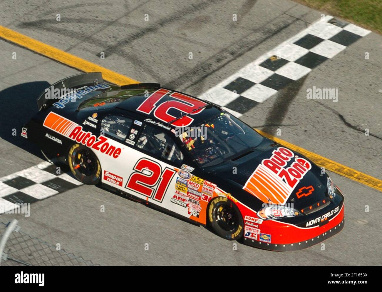 Kevin Harvick crosses the finish line to win the NASCAR Busch Series ...