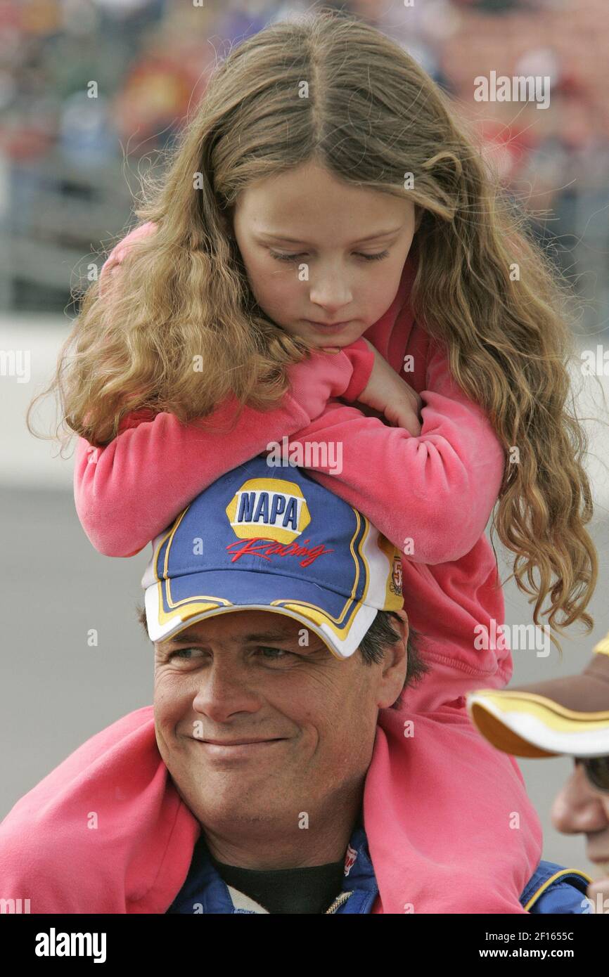 Macy Waltrip sits on the shoulders of her dad, Michael, before the ...