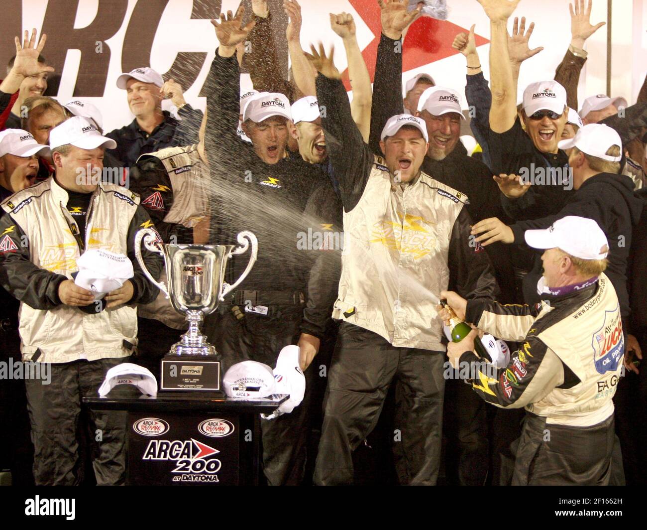 Bobby Gerhart celebrates with his crew after winning the ARCA 200 at ...