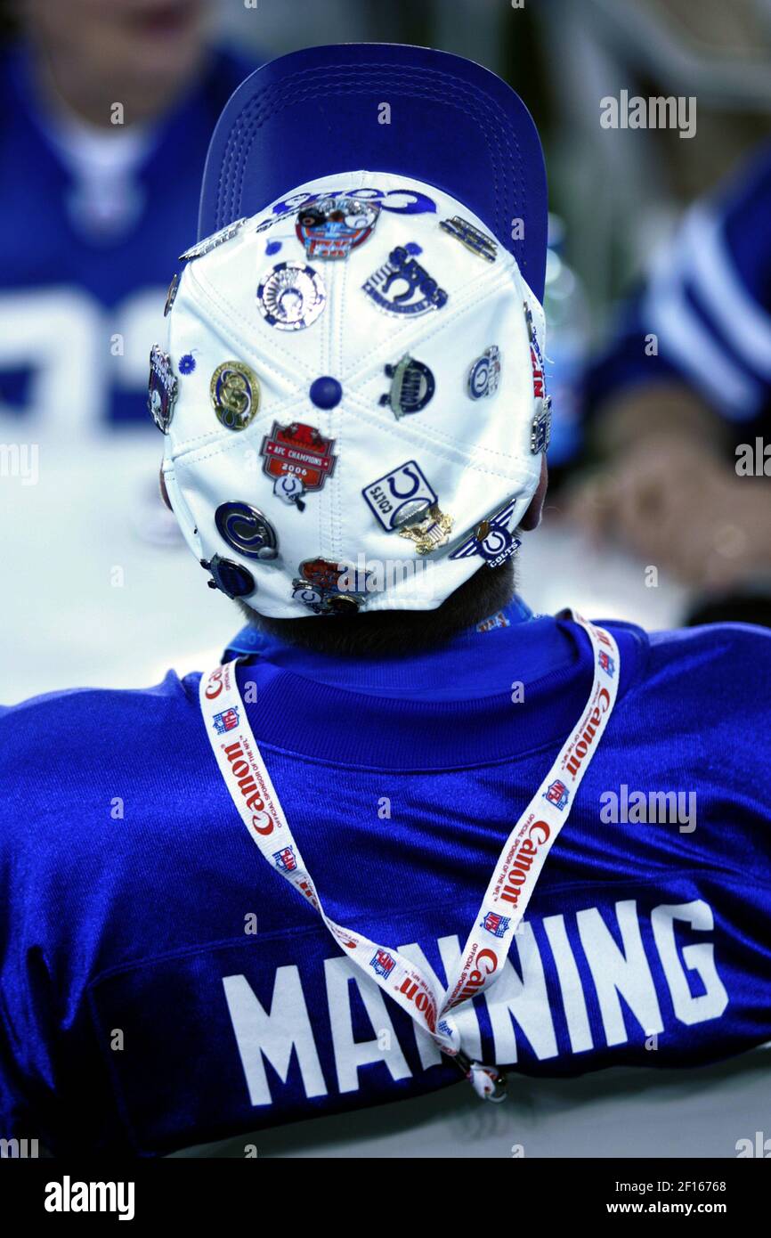 Richard Hite wears a pin-covered cap at the NFL Experience outside ...