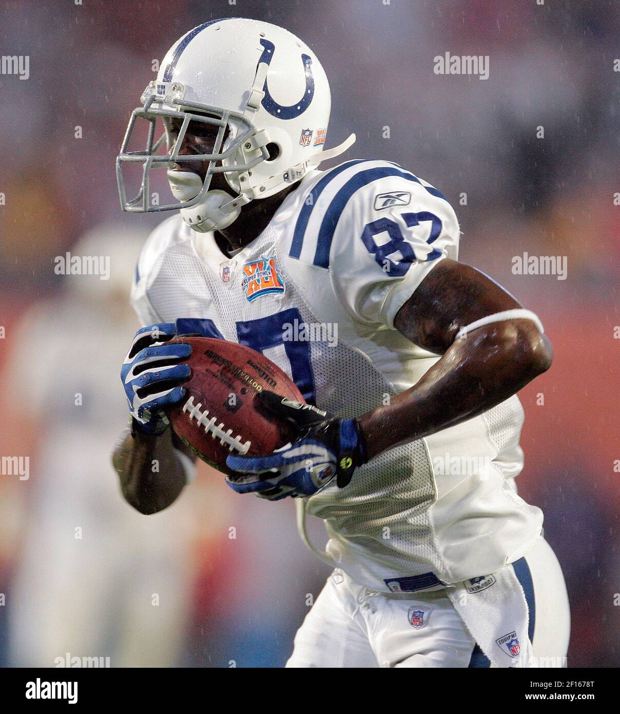 The Indianapolis Colts' Reggie Wayne (87) breaks away on a long pass ...