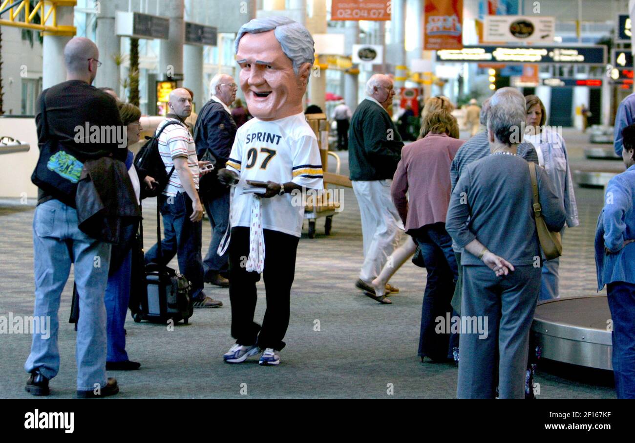 Andrew Washington wears a giant head that is supposed to look like Don ...