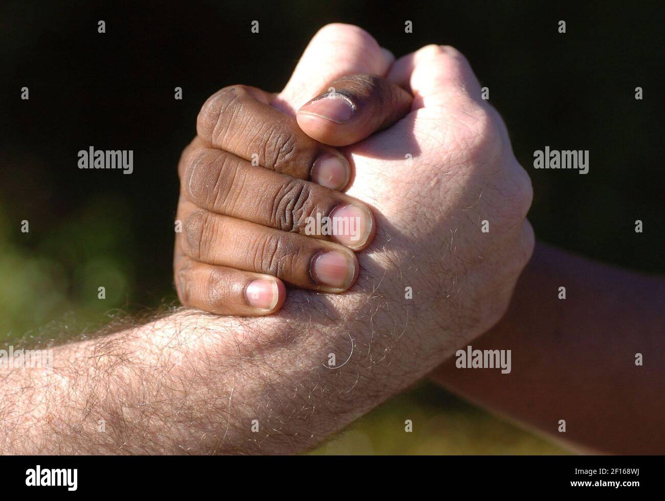 Tony Hicks, left, and Marcus Thompson give a 70's soul handshake ...