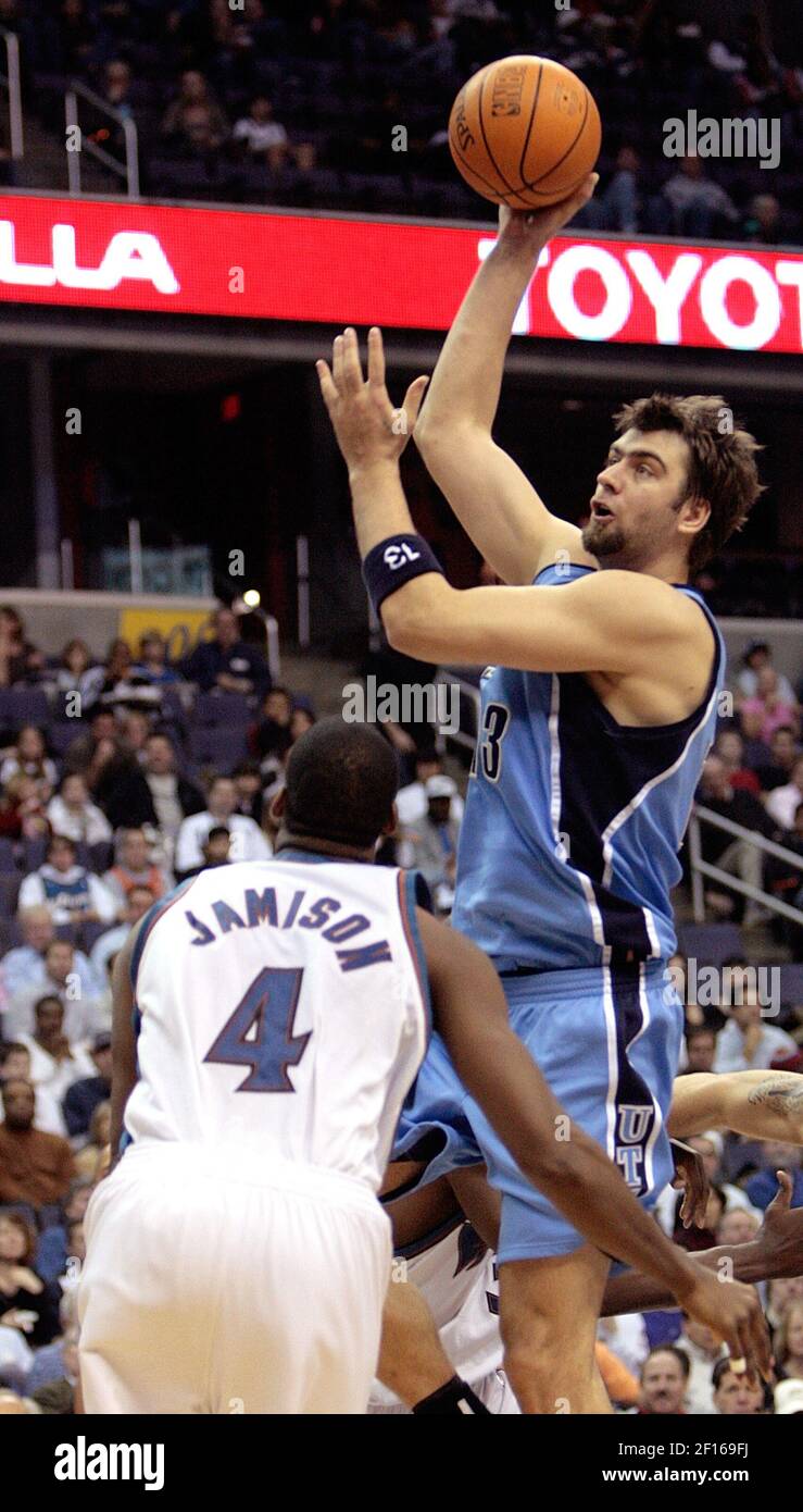 Utah Jazz Mehmet Okur (13) scores over Washington Wizards Anawn Jamison ...