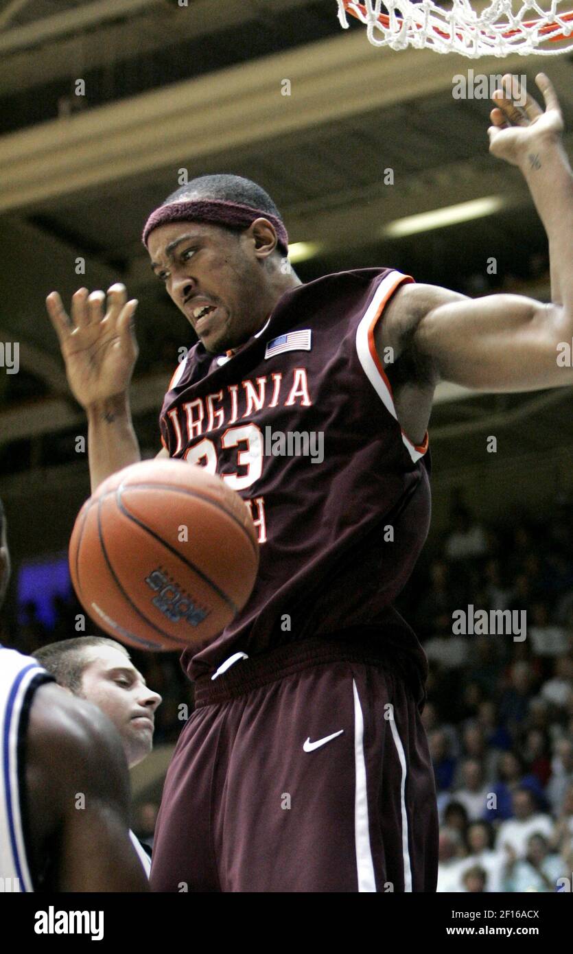Virginia Tech's Coleman Collins (33) dunks over Duke's Josh McRoberts ...
