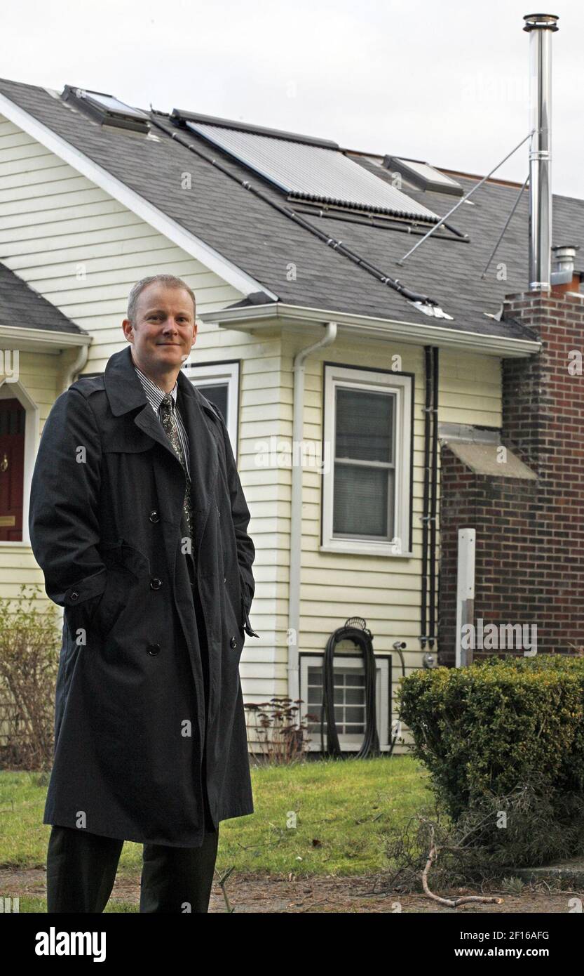 Dave Reid, a member of Seattle Peak Oil Awareness, added solar panels ...