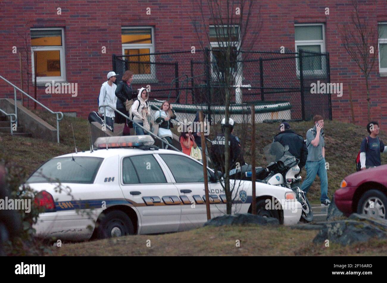 Students at Foss High School evacuate the building after an early ...