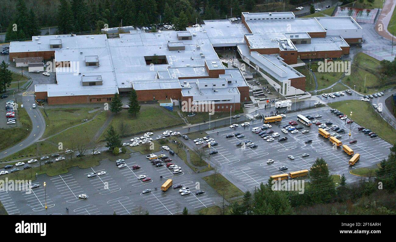 Students at Foss High School evacuate the building after an early ...