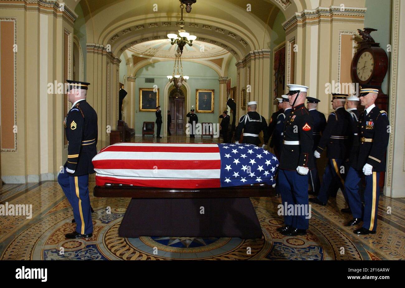 A military honor guard escorts President Gerald Ford's casket from the ...