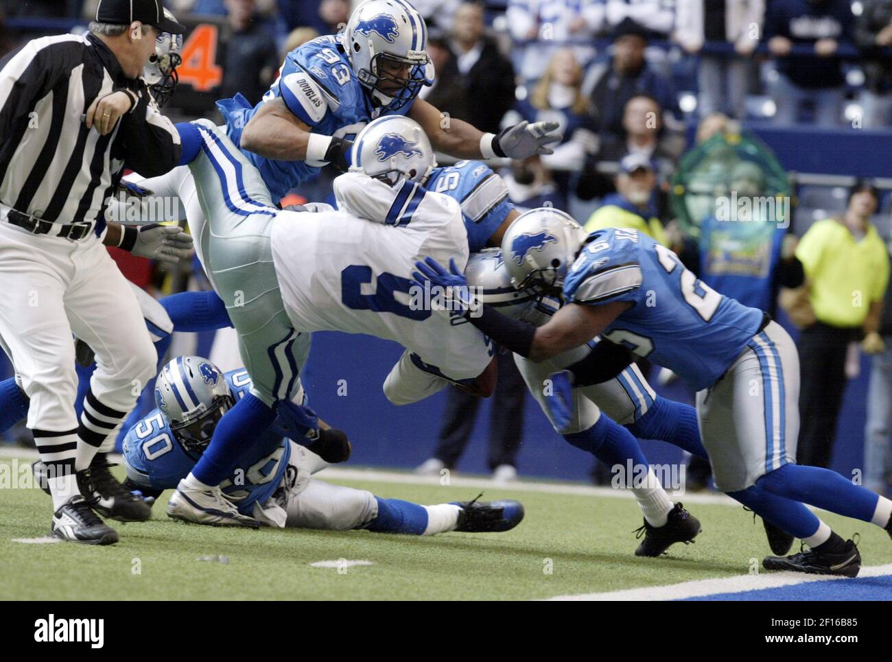 Detroit Lions defenders Corey Smith (93), Paris Lenon (53) and Kenoy ...