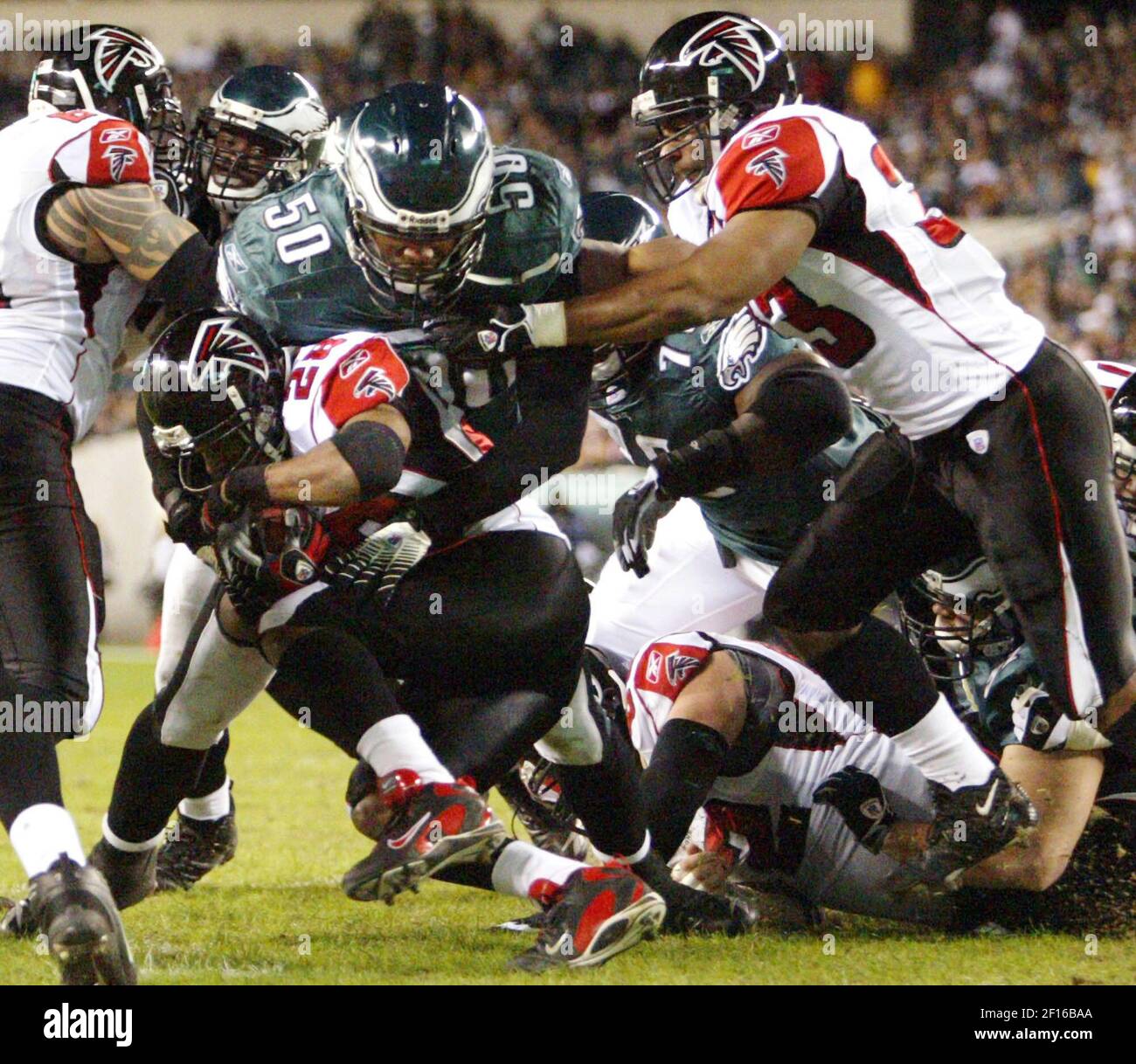 Atlanta Falcons running back Warrick Dunn (28) gets tackled by ...