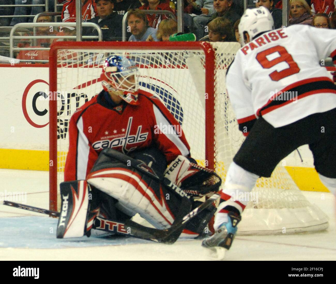 The New Jersey Devils' Zach Parise (9) taps home a goal past Washington ...