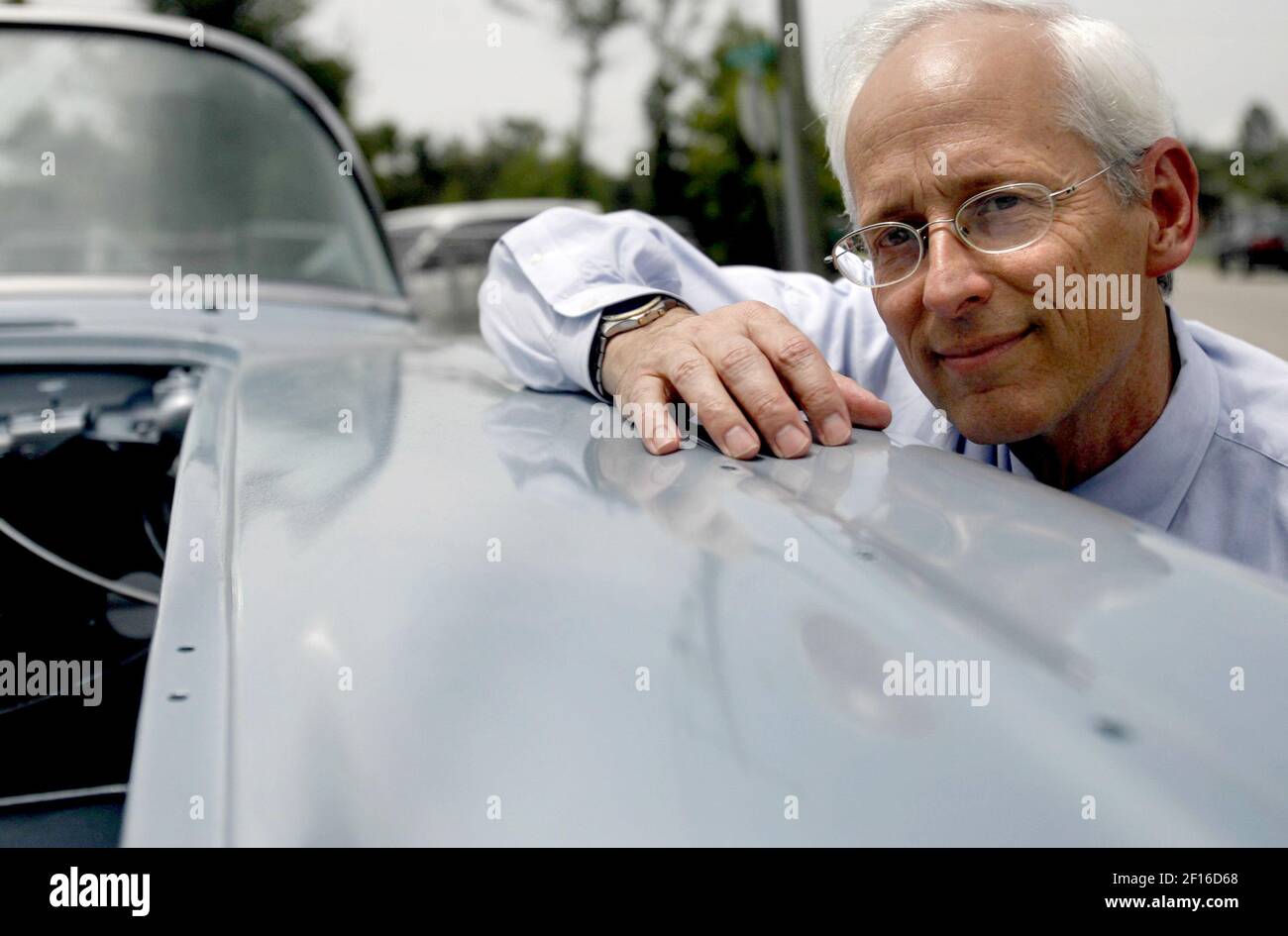John Harral with his Corvette that is being restored after Hurricane ...