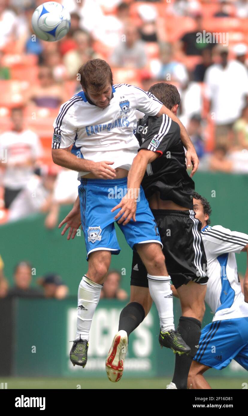San Jose Earthquakes defender Eric Denton (left) heads the ball against ...