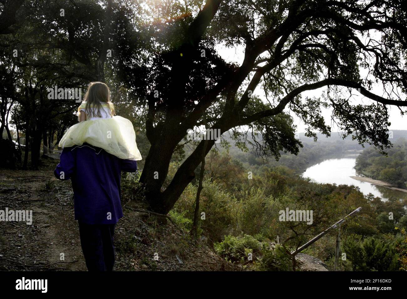 Jimmy Baldwin carries daughter, Ruby Baldwin, 3, at the Double J ...