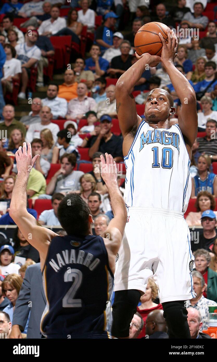 Orlando Magic's Keith Bogans puts up a shot over Memphis Grizzlies ...