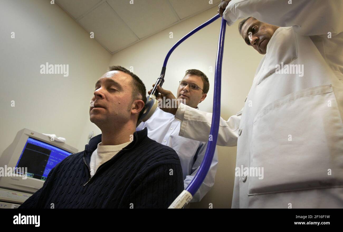 Dr. Manoj Raghavan, right, with Froedtert Hospital and the Medical ...