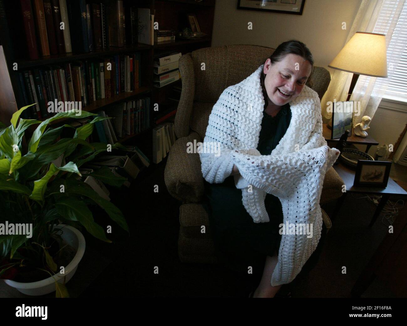 The Rev. Natalie Chamberlain, pastor of United Christian Church, covers ...