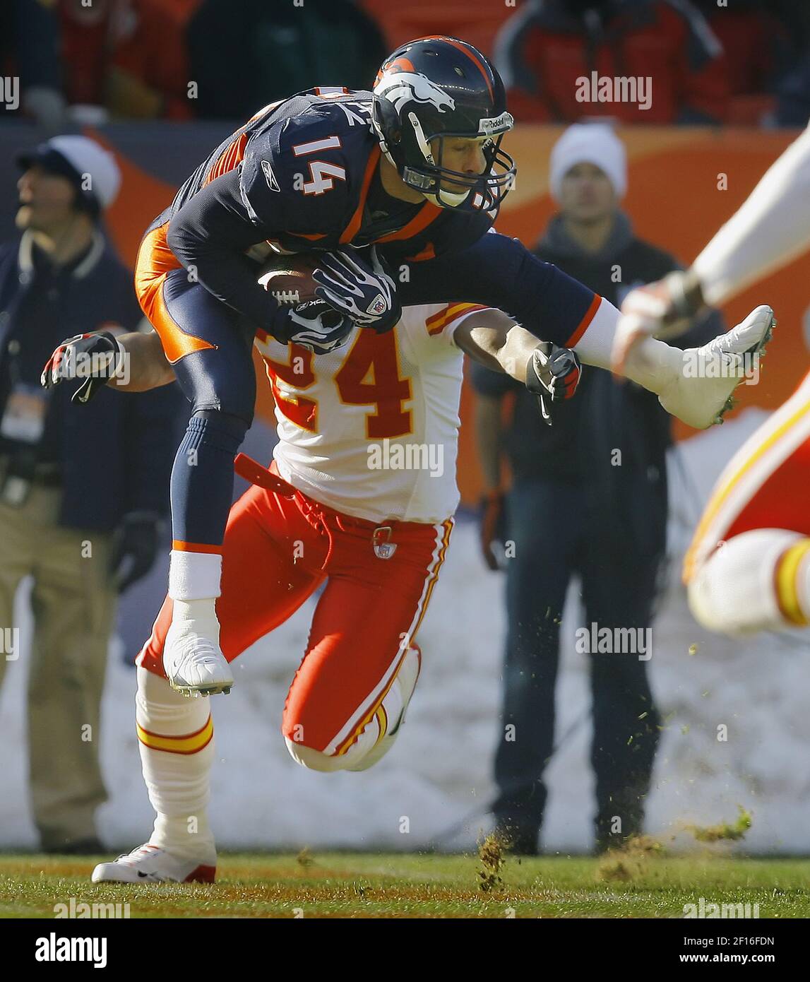 Kansas City Chiefs cornerback Ty Law (background, 24) can't stop Denver ...