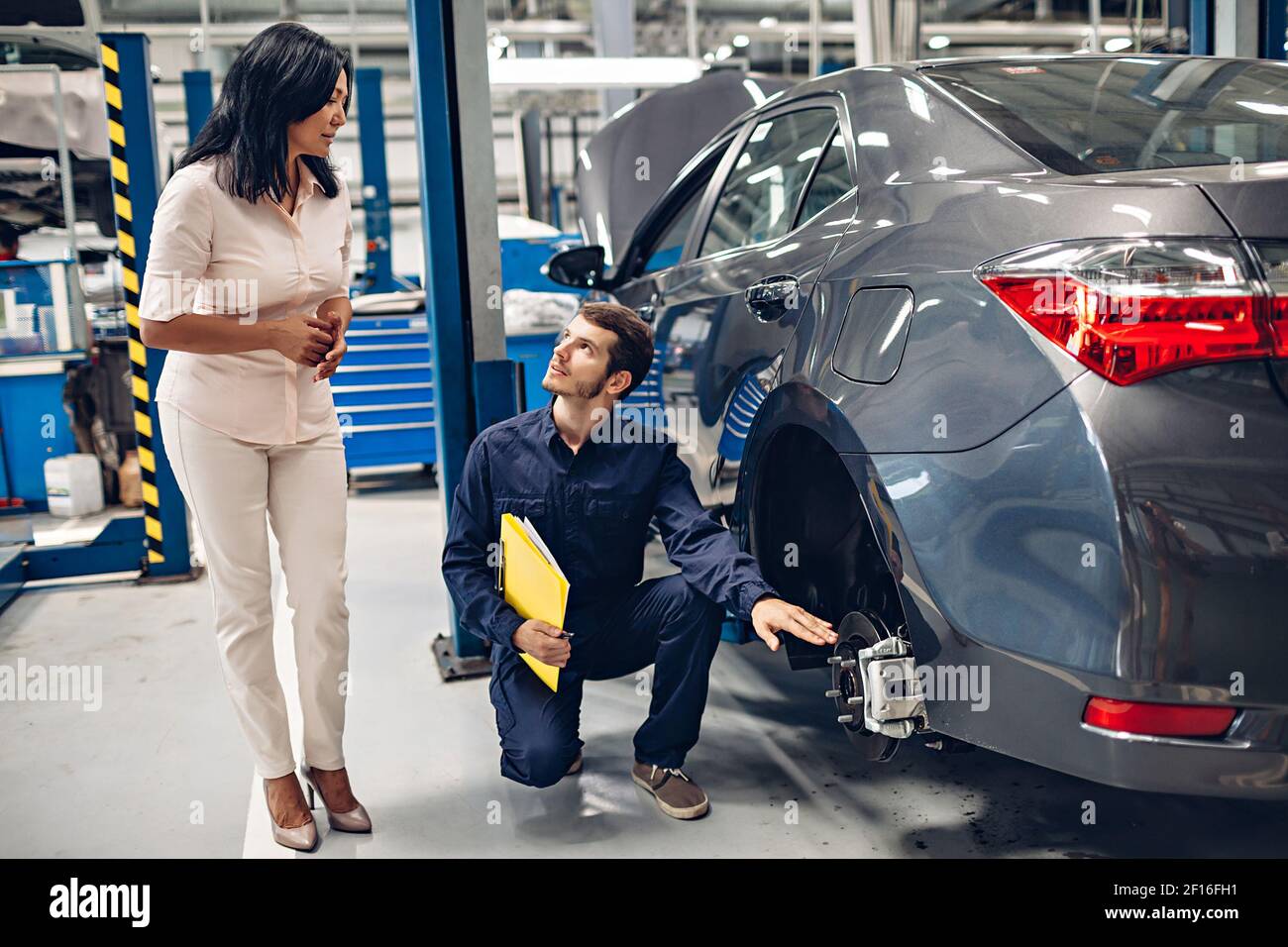 Checking car hi-res stock photography and images - Alamy
