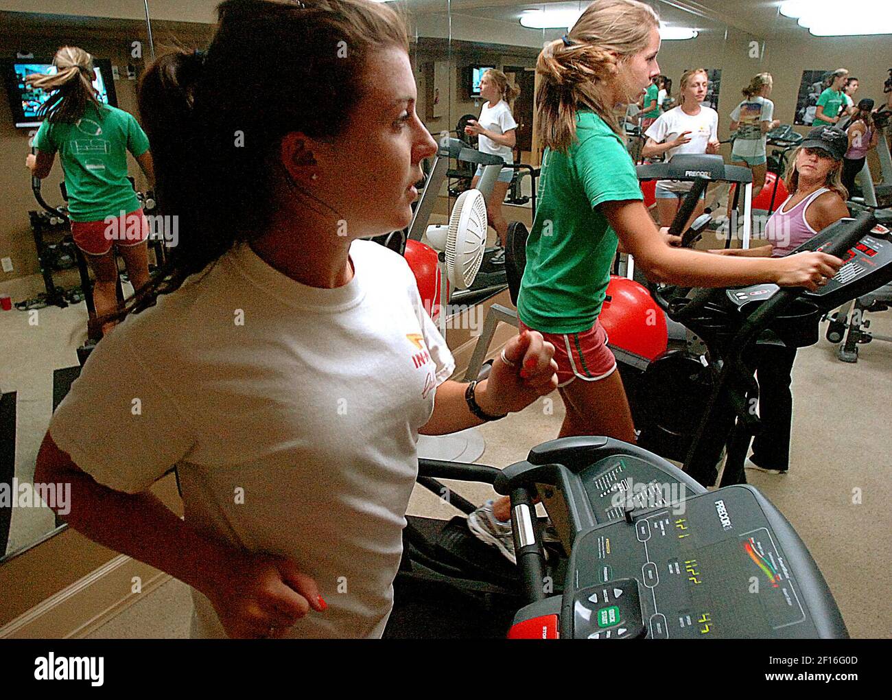 Lauren Kelley (left), Megan Kelley (center), and Lizzie Jewson exercise ...