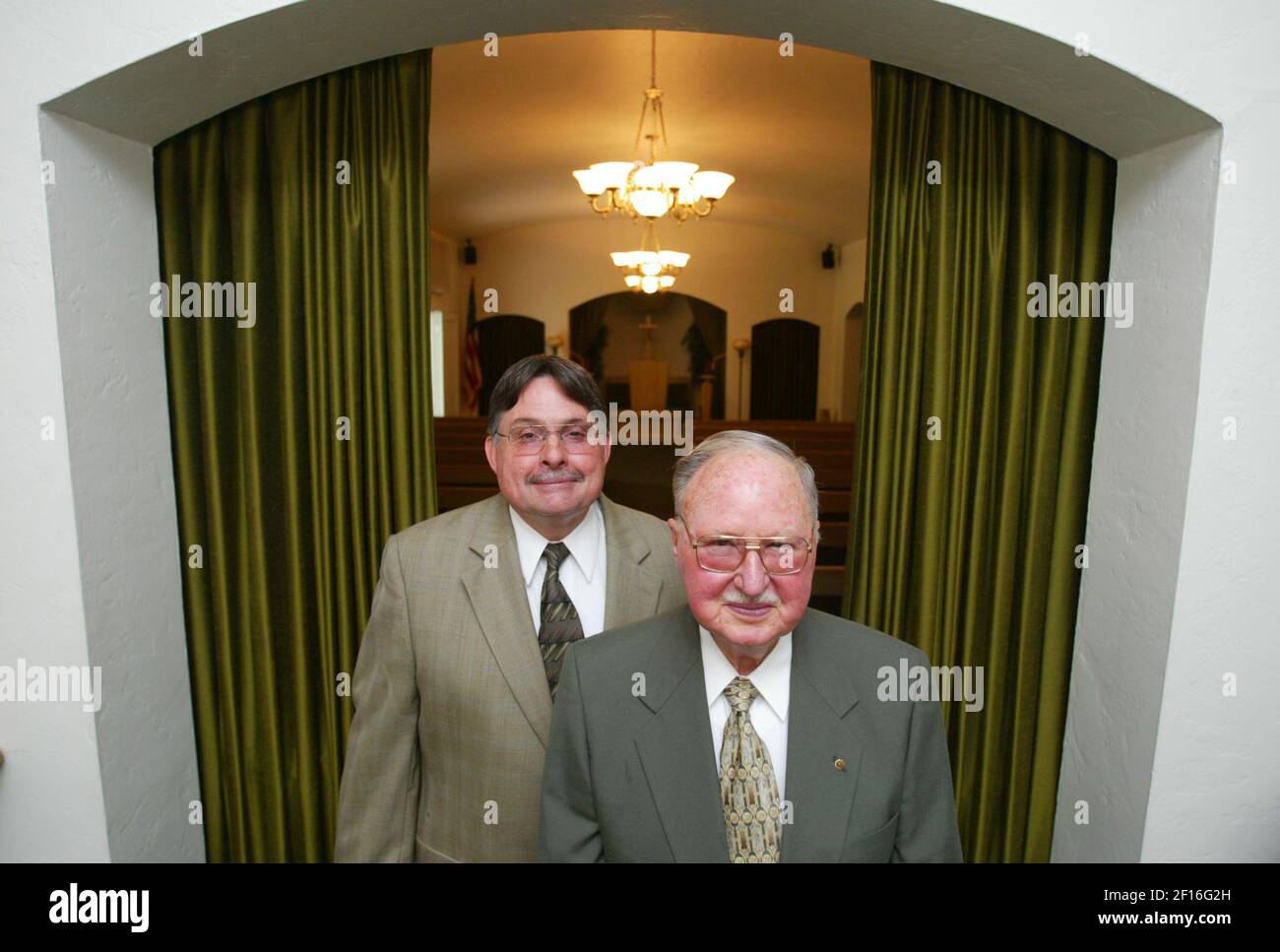 Corby Dale, right, and his son Alan Dale stand in their Phipps-Dale ...