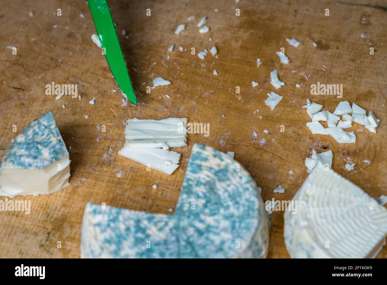 Pieces of cheese with blue mold Stock Photo - Alamy