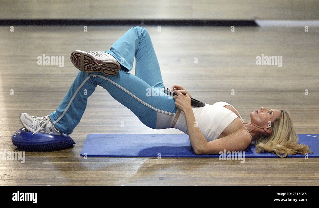 Nancy Cole demonstrates the single leg weighted pelvic tilt with a Dyna ...