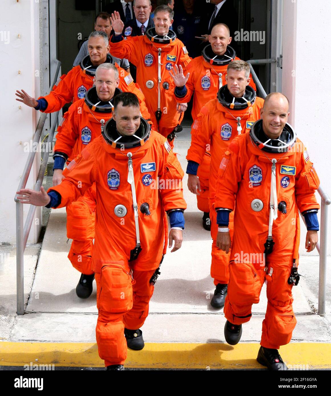 Space Shuttle Atlantis astronauts (first row, left-right) Pilot Lee ...