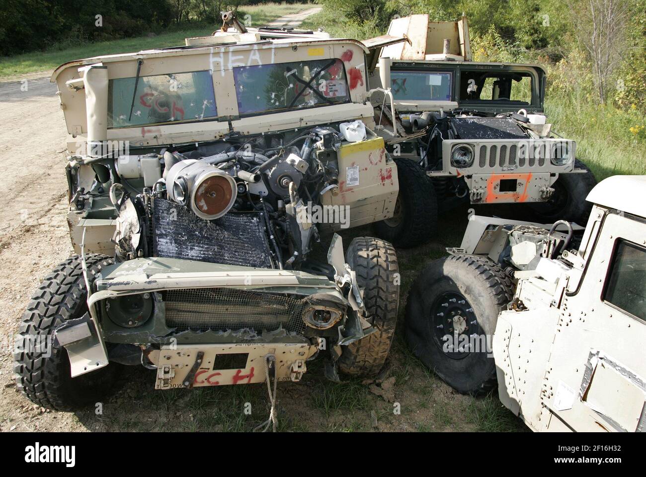 Heavily damaged military Humvees stored at the Red River Army Depot in ...