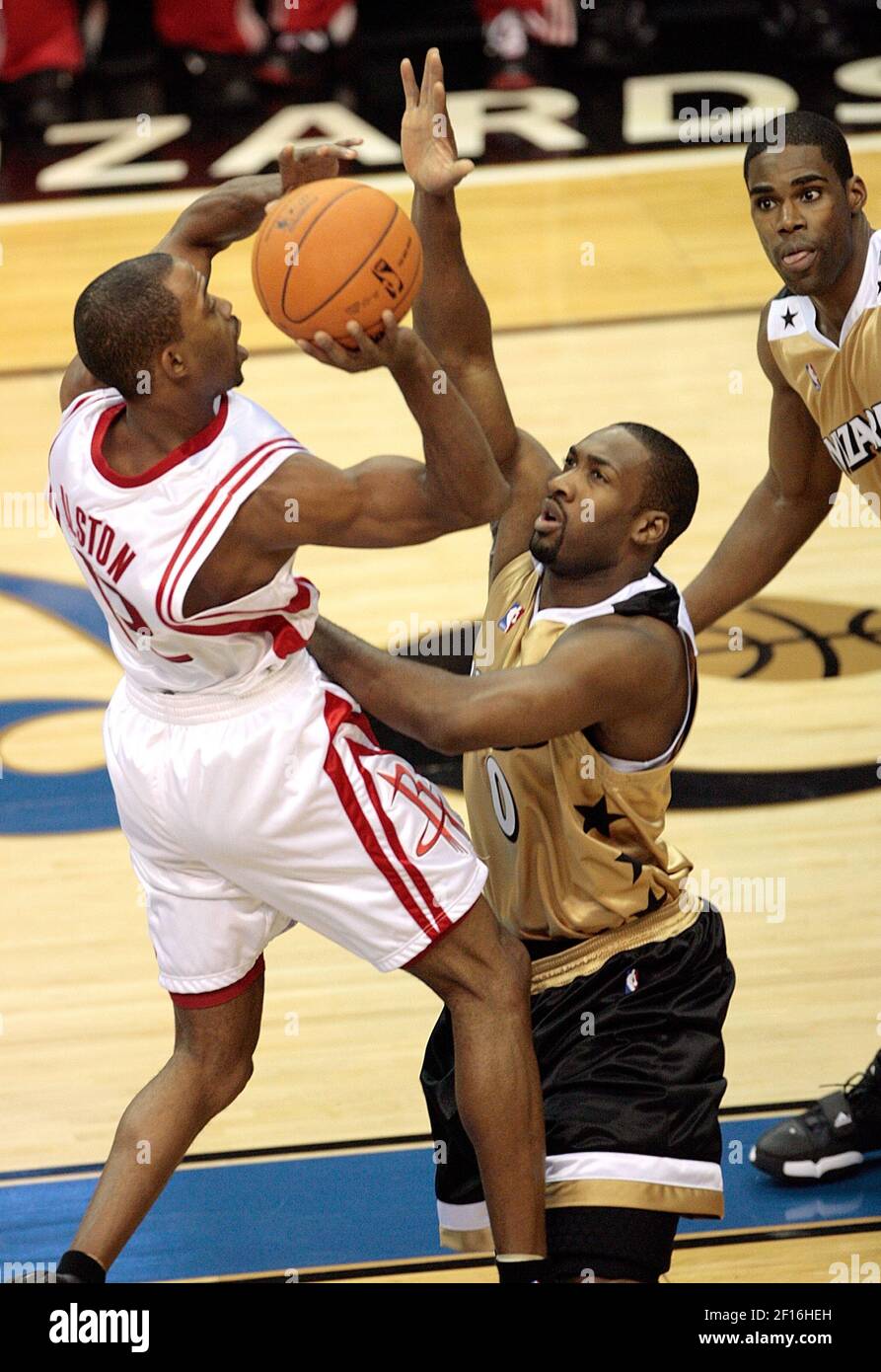 Houston Rockets Rafer Alston (12) shoots over Washington Wizards ...