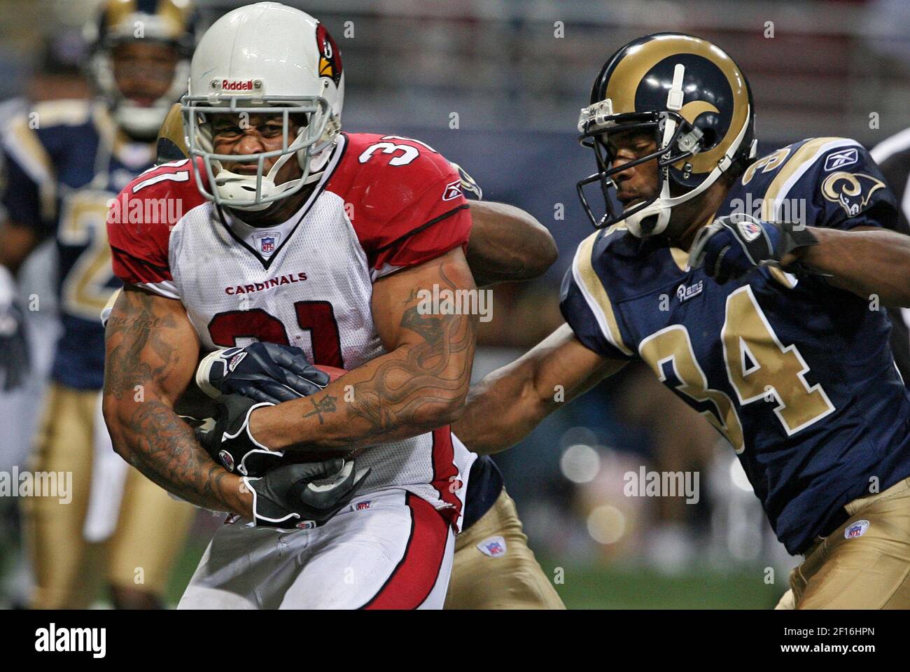 The Arizona Cardinals' Marcel Shipp (31) scores despite the defensive ...
