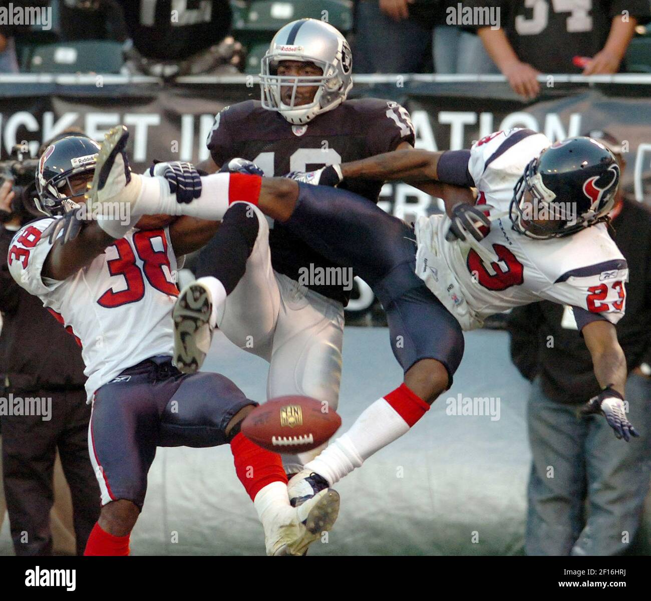 Oakland Raiders wide receiver Randy Moss (18) can't catch a pass in the ...